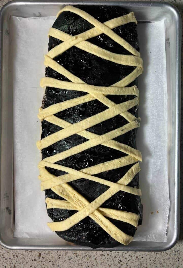 Halloween Easy Mummy Calzone Recipe - Dine Dream Discover